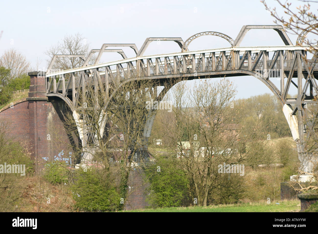 single track victorian metal girder canal bridge Stock Photo - Alamy