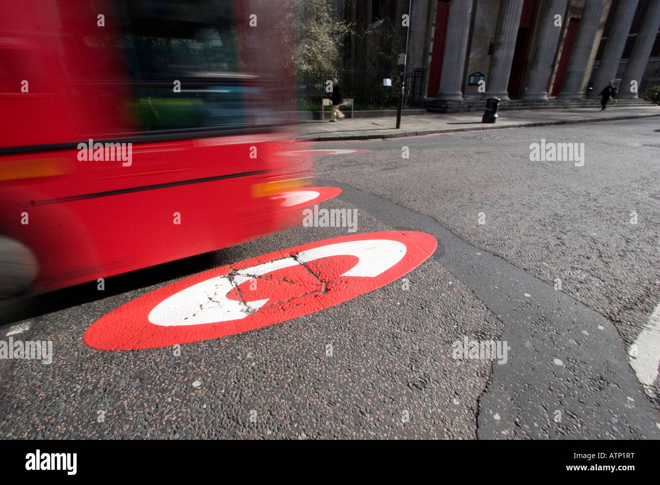 congestion charge zone with giant C in road to signify entry into zone ...