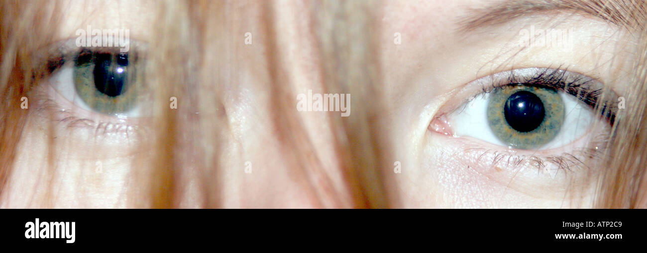 Girls Eyes covered by hair panoramic Stock Photo - Alamy