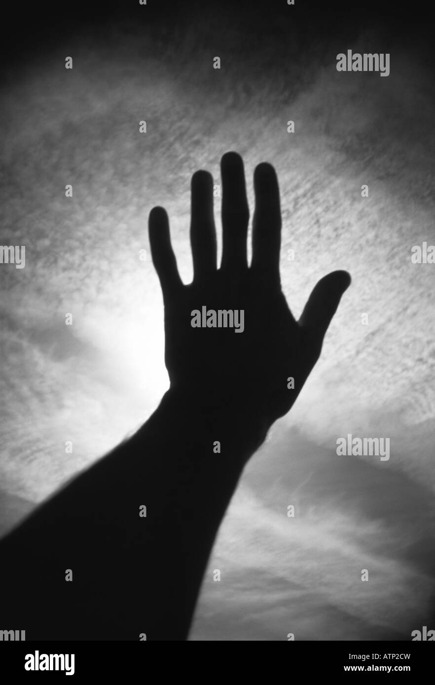 Man reaching touch Black and White Stock Photos & Images - Alamy