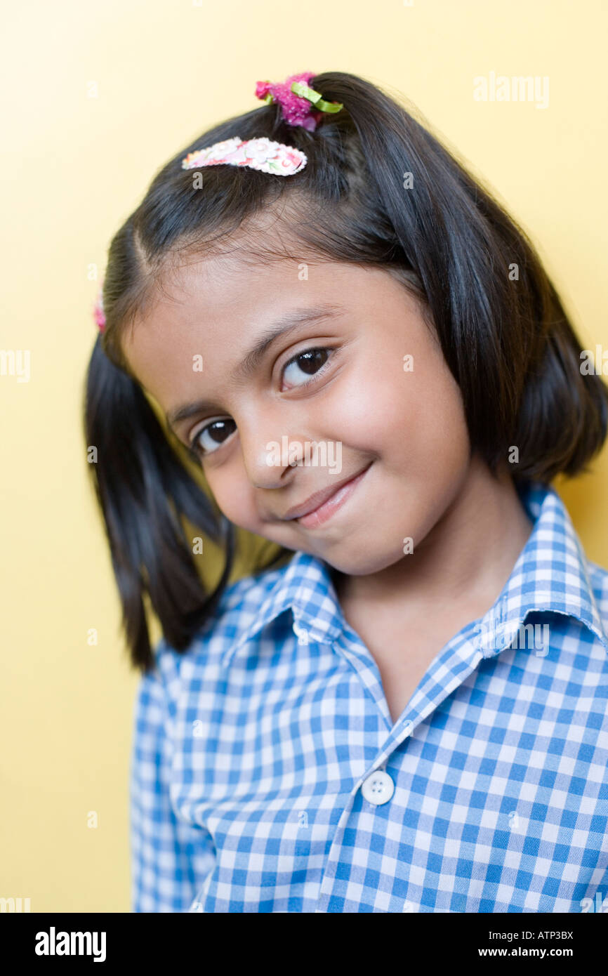 Portrait of a schoolgirl smirking Stock Photo - Alamy