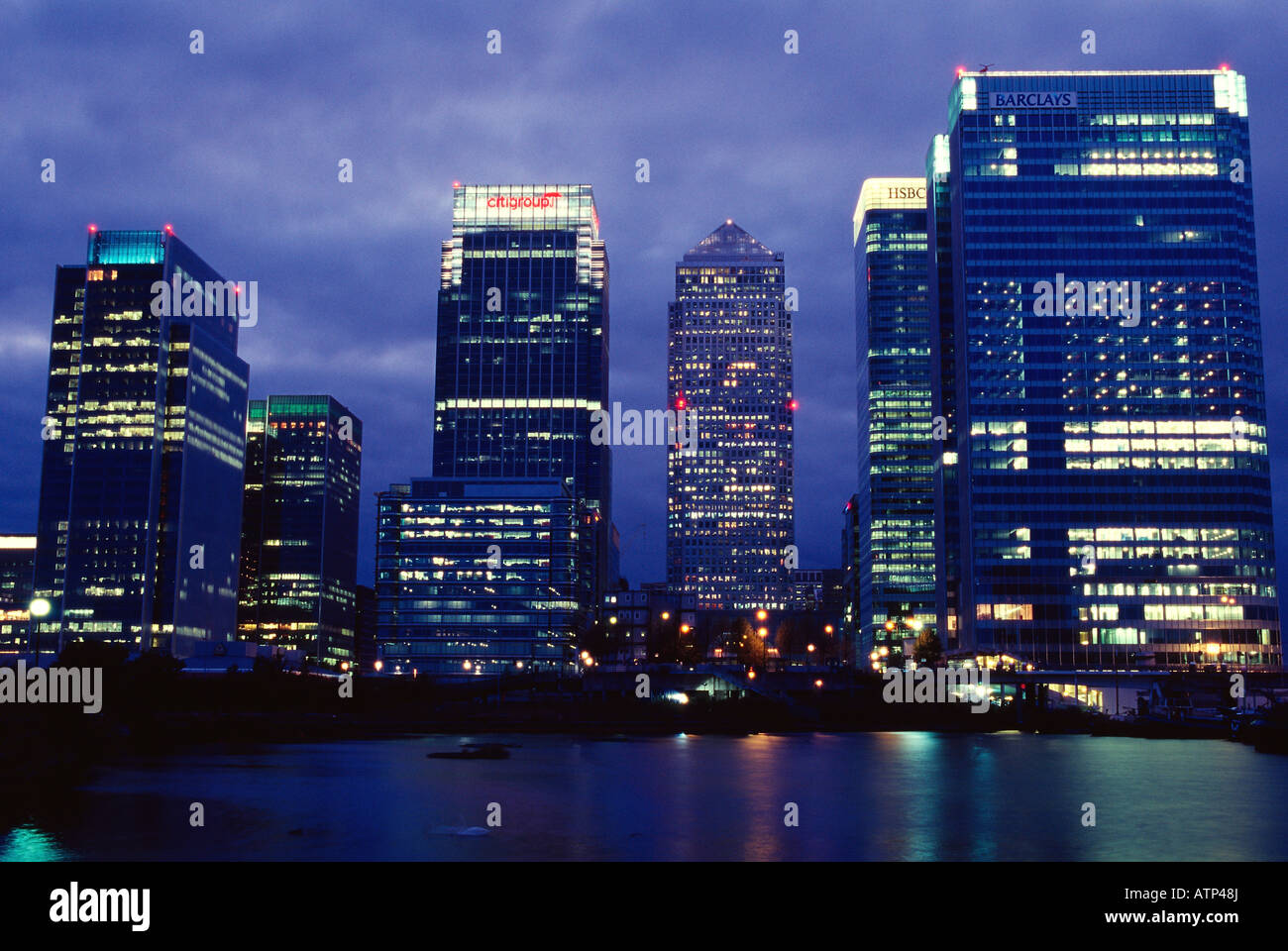 london docklands canary wharf high rise tower blocks night reflections ...