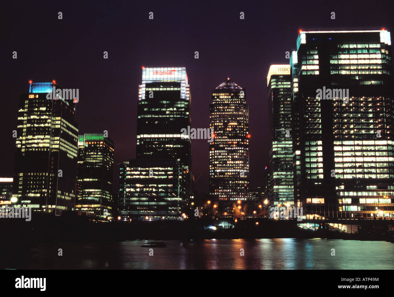 london docklands canary wharf high rise tower blocks night reflections ...