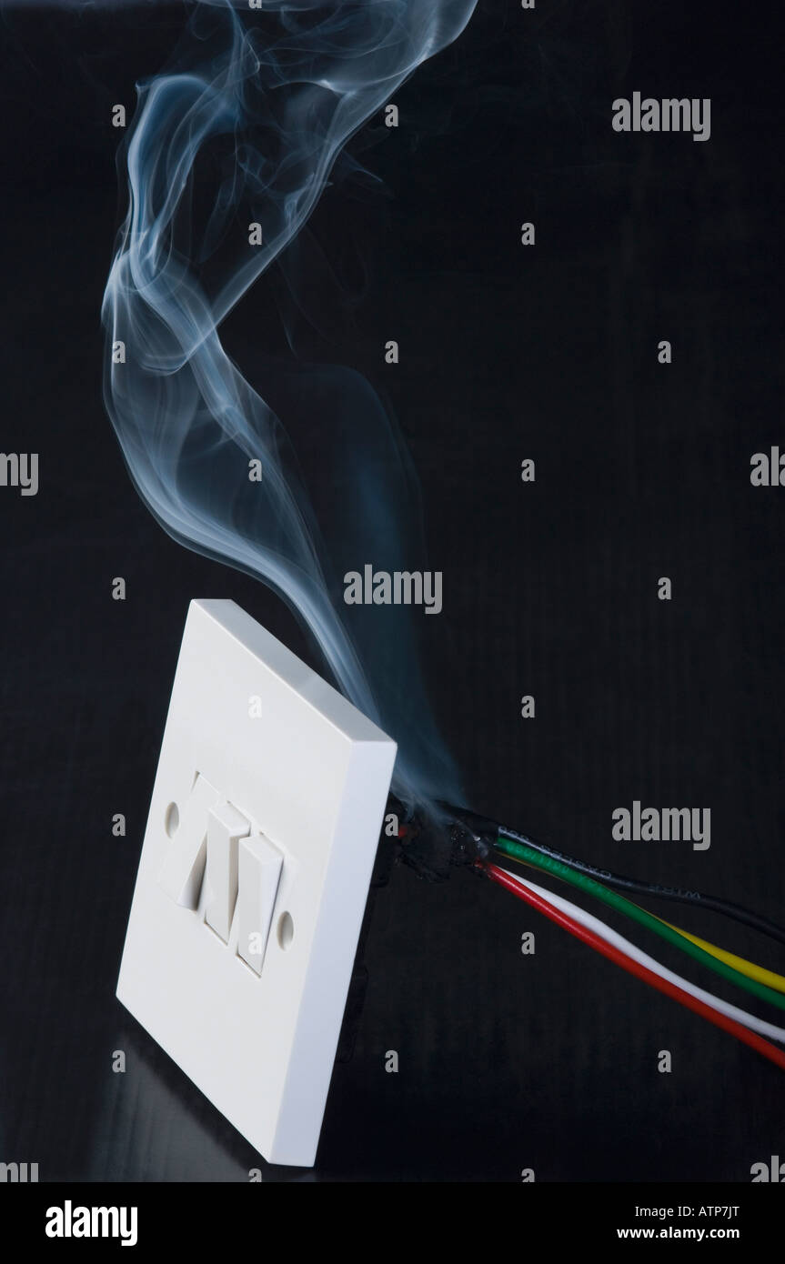 Smoke coming out from a switchboard Stock Photo - Alamy