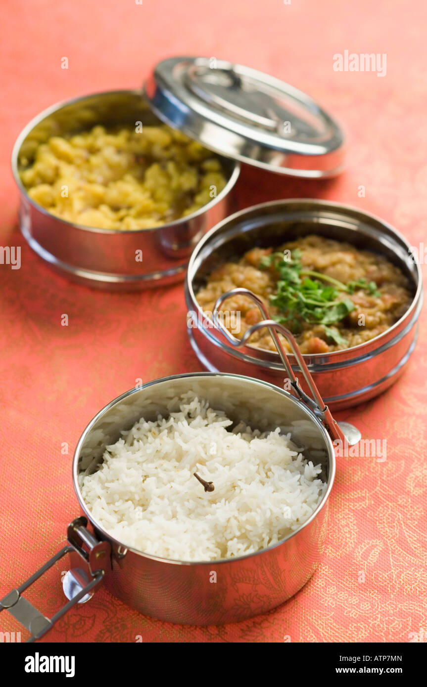 Close-up of tiffin boxes of rice and curry Stock Photo - Alamy