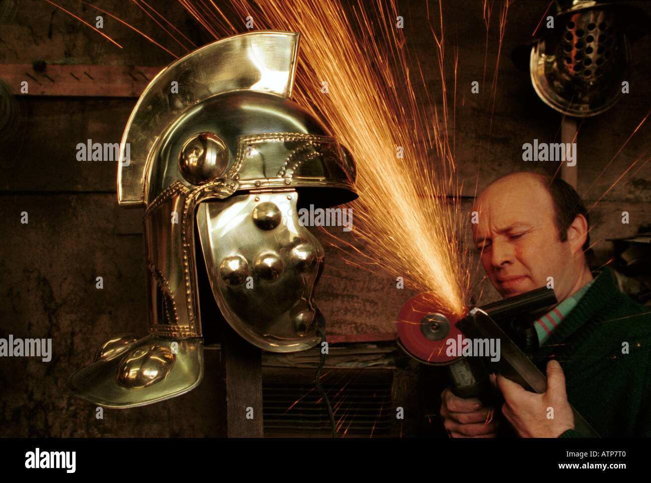 An armourer making replica roman armour Leicestershire UK Stock Photo ...