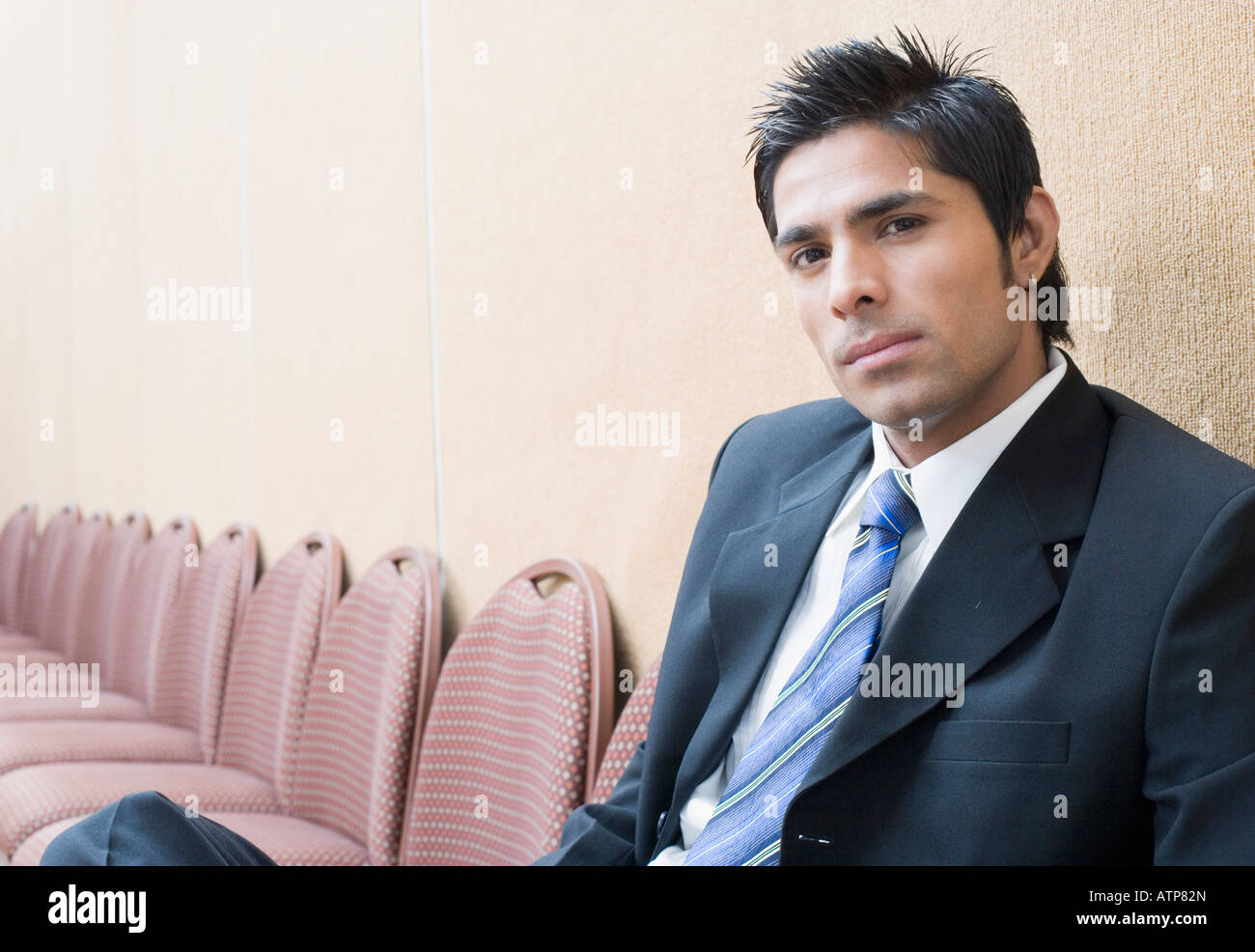 Portrait of a businessman thinking Stock Photo - Alamy
