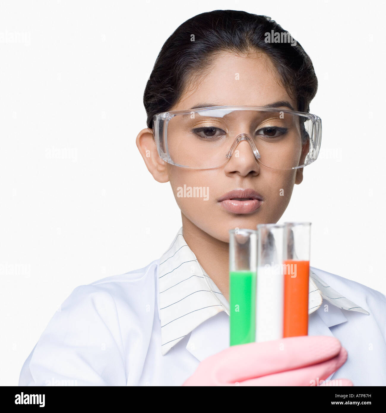 Close-up of a female scientist holding test tubes in a laboratory Stock ...
