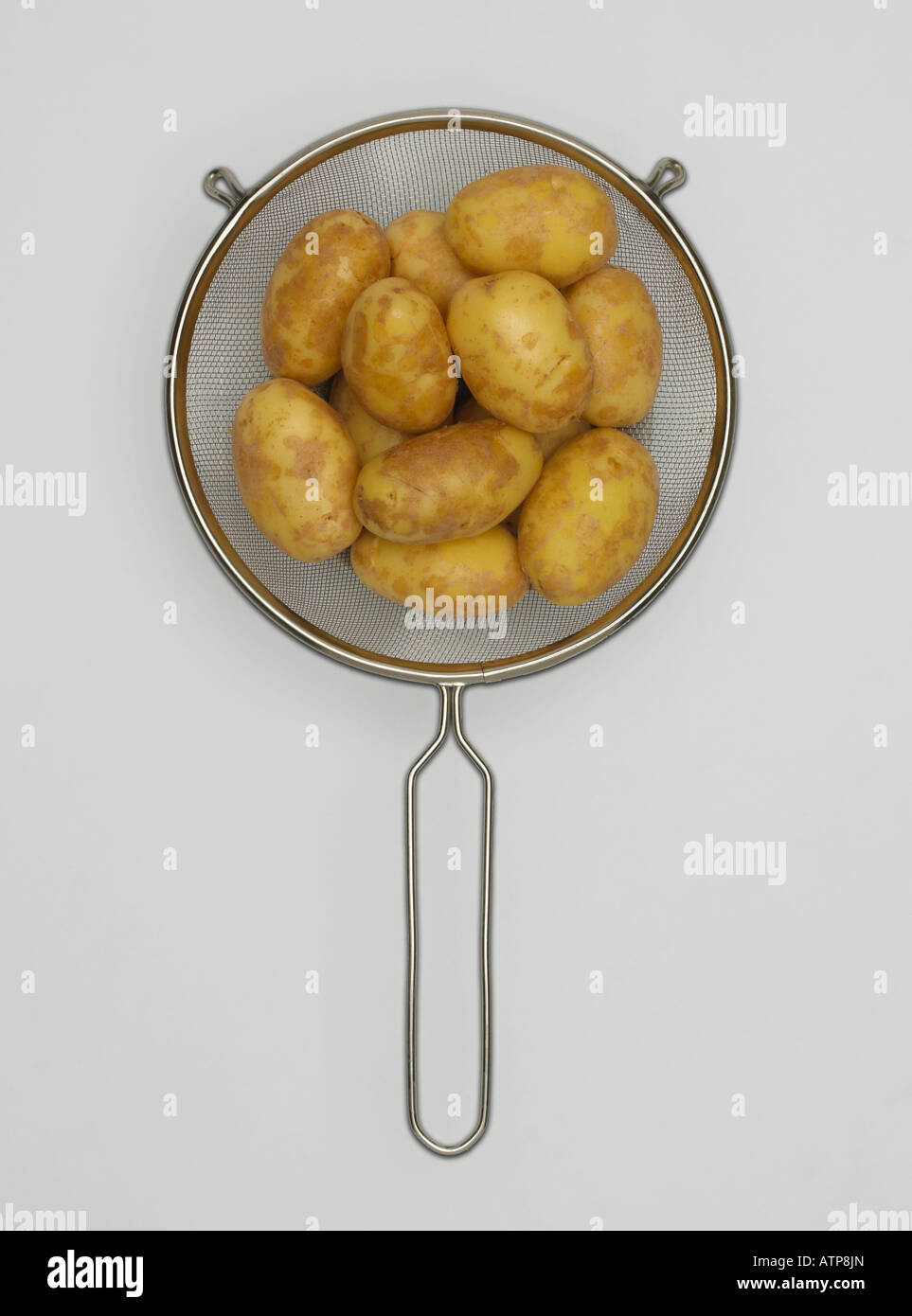 Potato sieve hi-res stock photography and images - Alamy