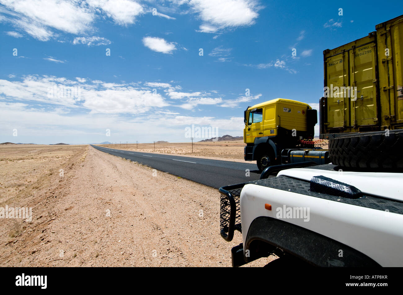 Black top road through the Namib Desert in Namibia on the way to the ...