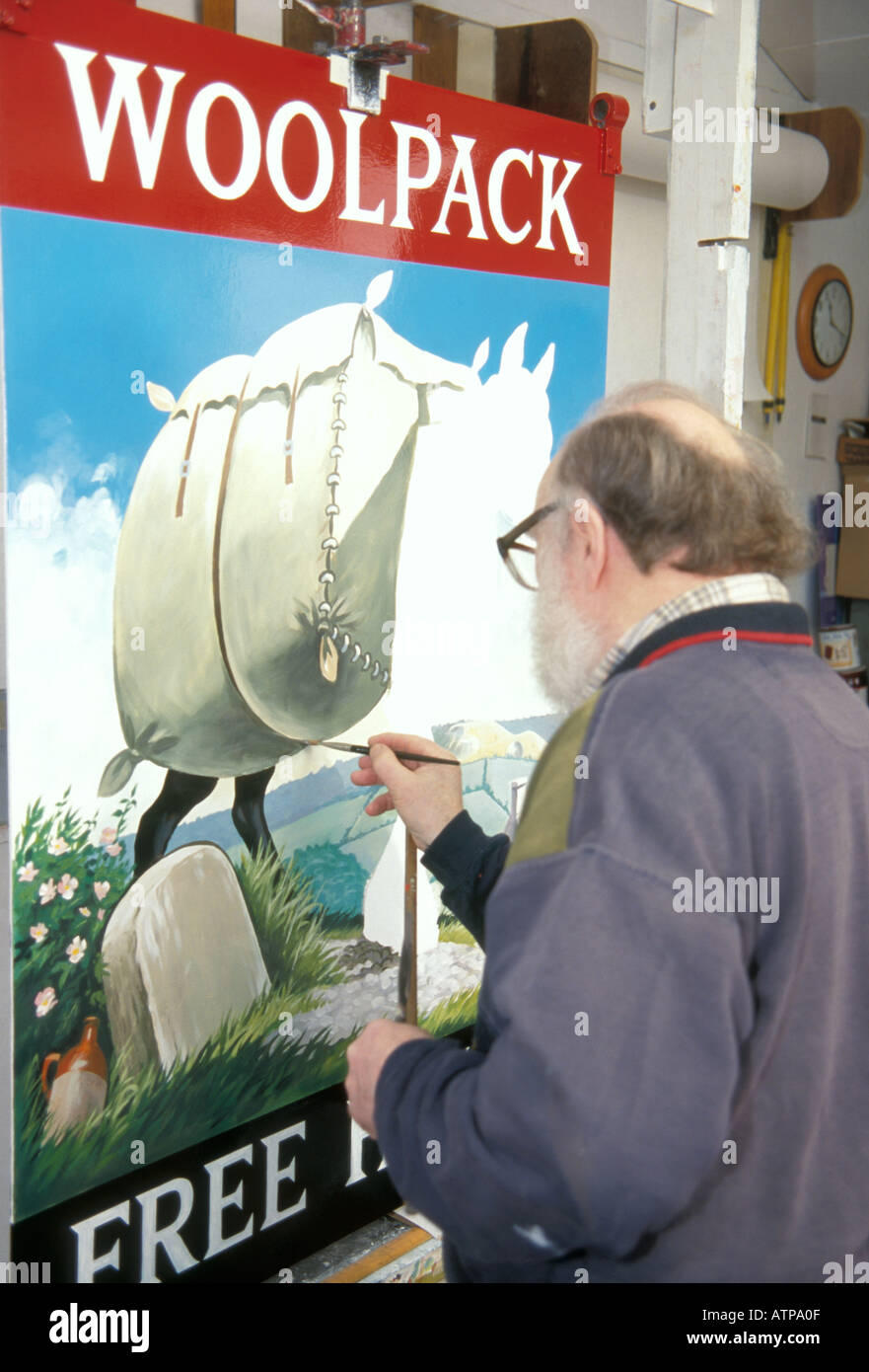 A traditional Pub sign painter Mike Hawkes working in his studio Stock ...