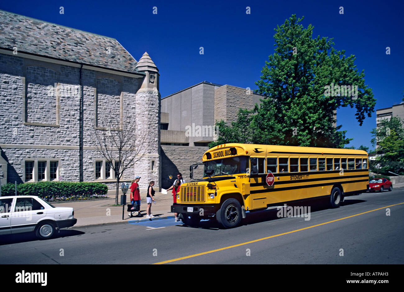 Students boarding school bus hi-res stock photography and images - Alamy