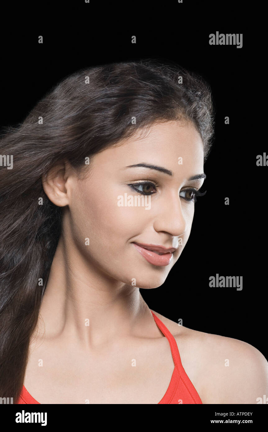 A beautiful woman smirking hi-res stock photography and images - Alamy