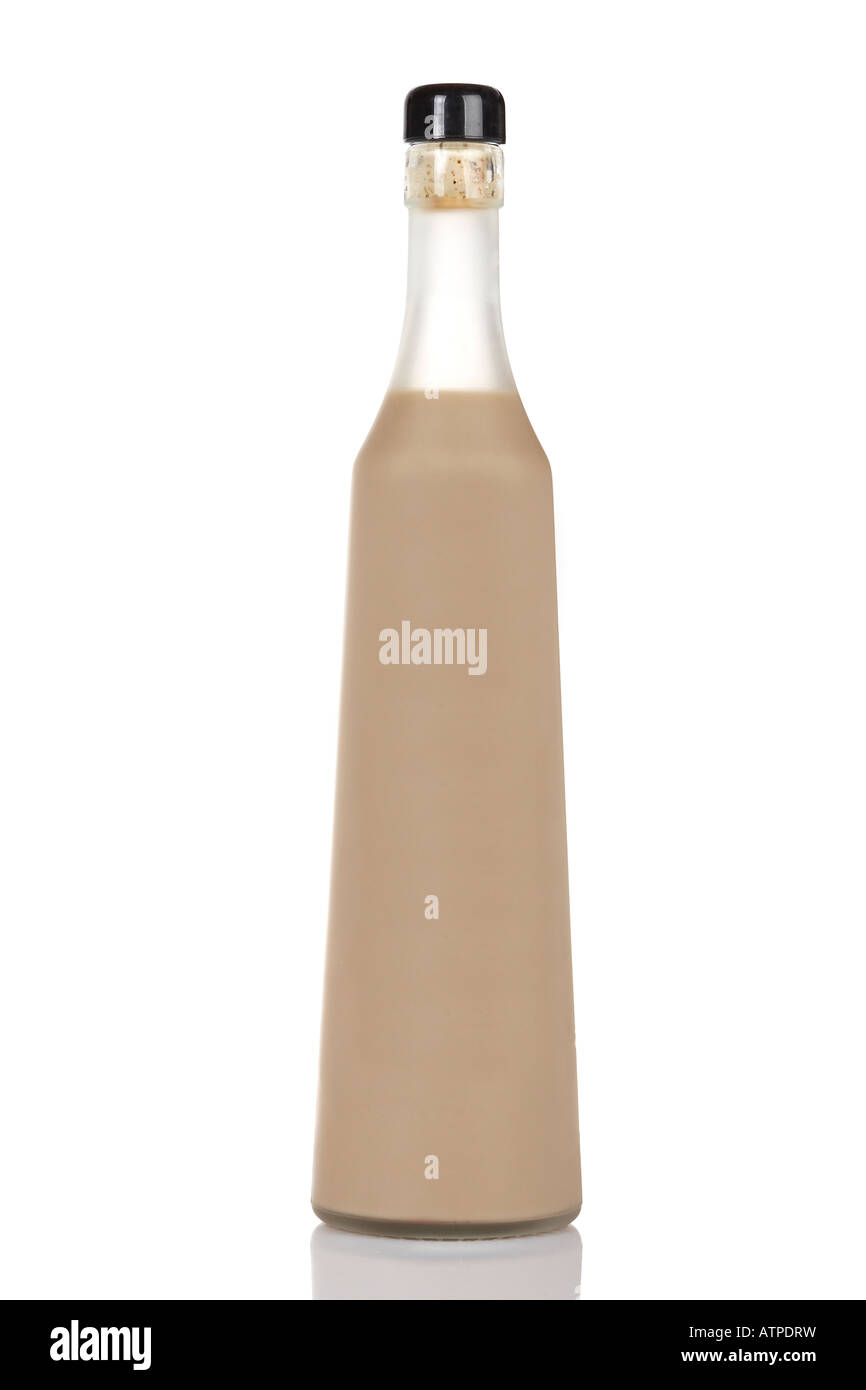 A whiskey cream bottle reflected on white background Stock Photo - Alamy