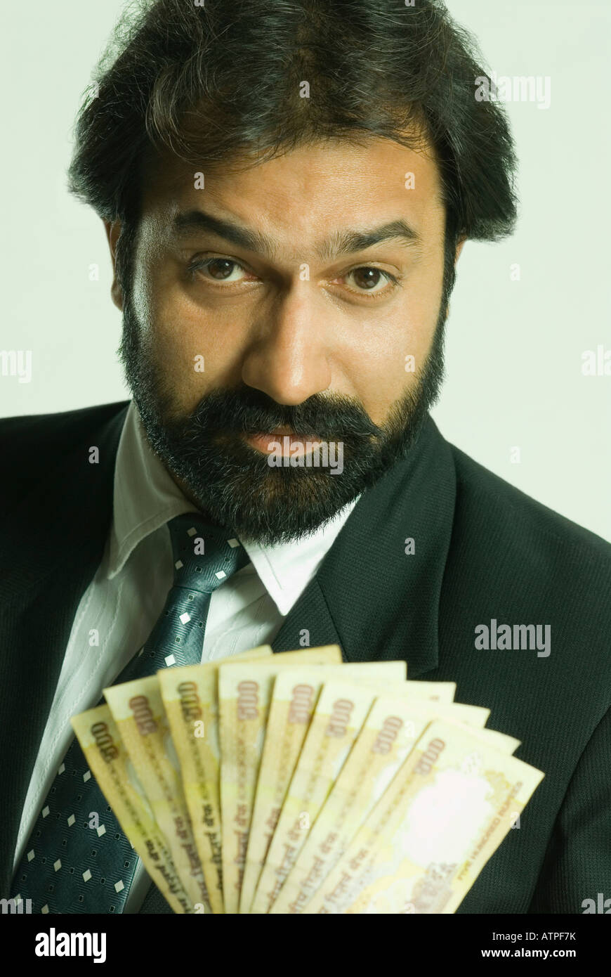Man holding indian rupee notes hi-res stock photography and images - Alamy