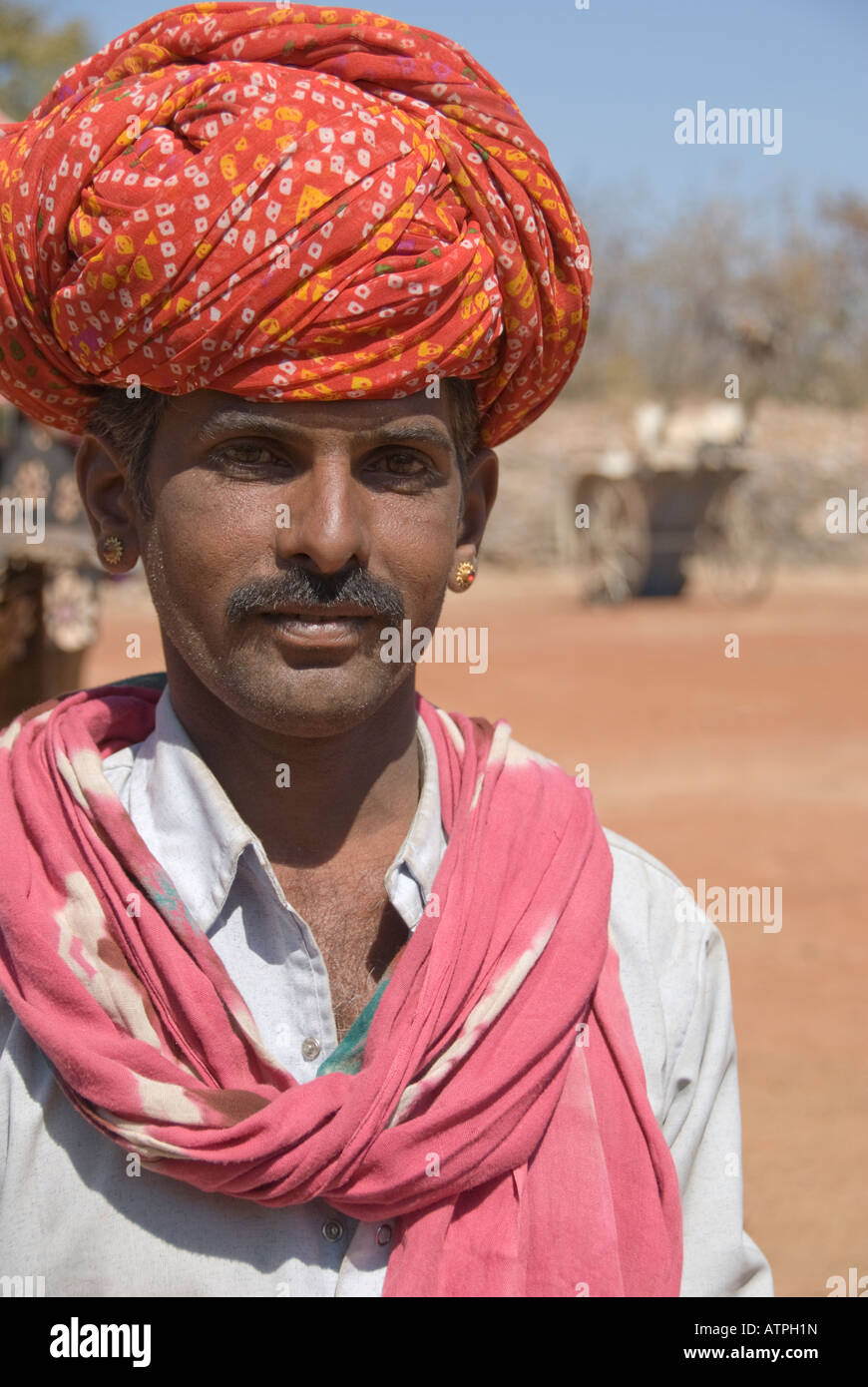 Indian Camel Driver with Turban and Scarf Stock Photo - Alamy