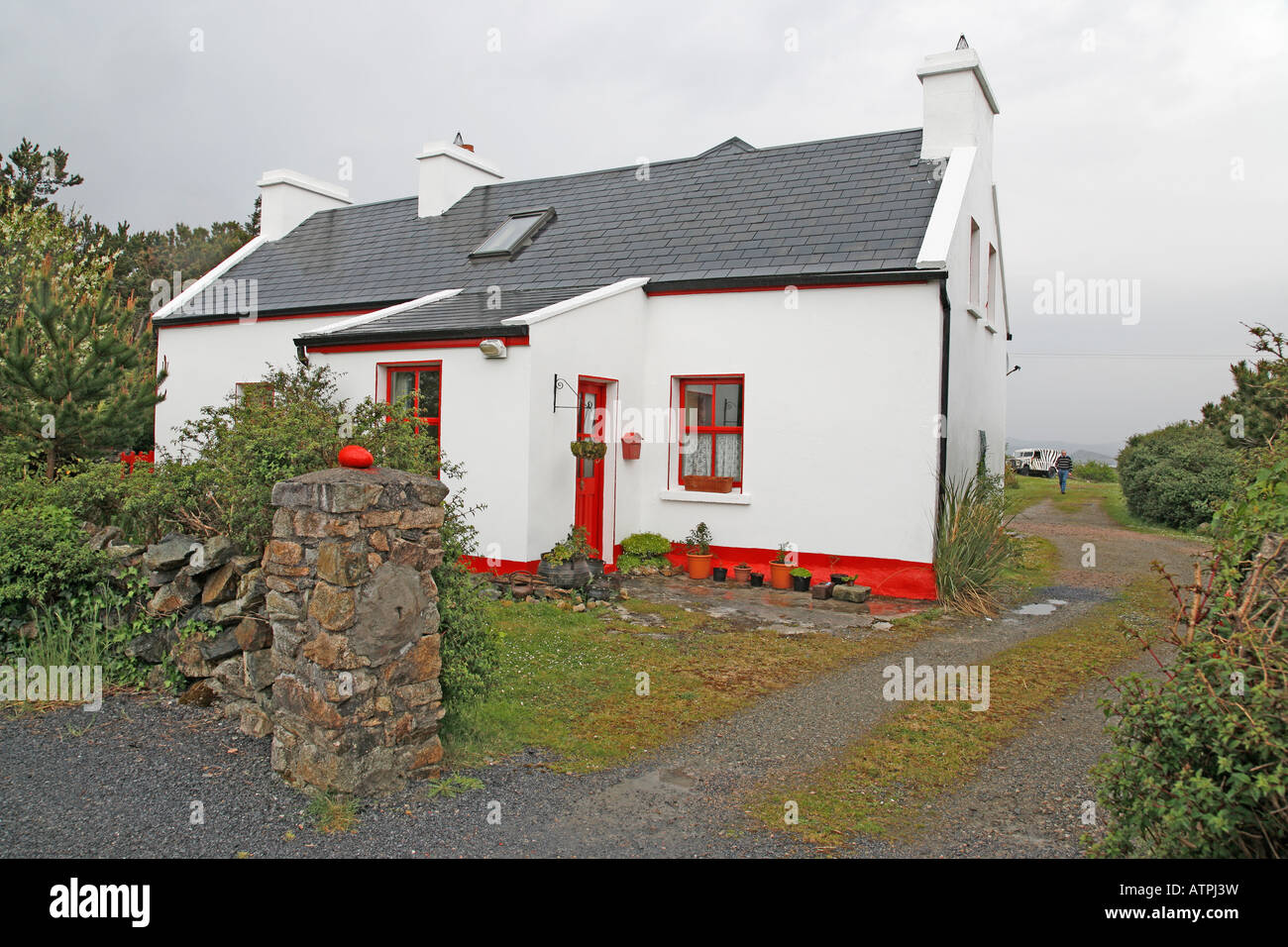 Cottage with red windows and doors in Connema, Ireland Stock Photo - Alamy