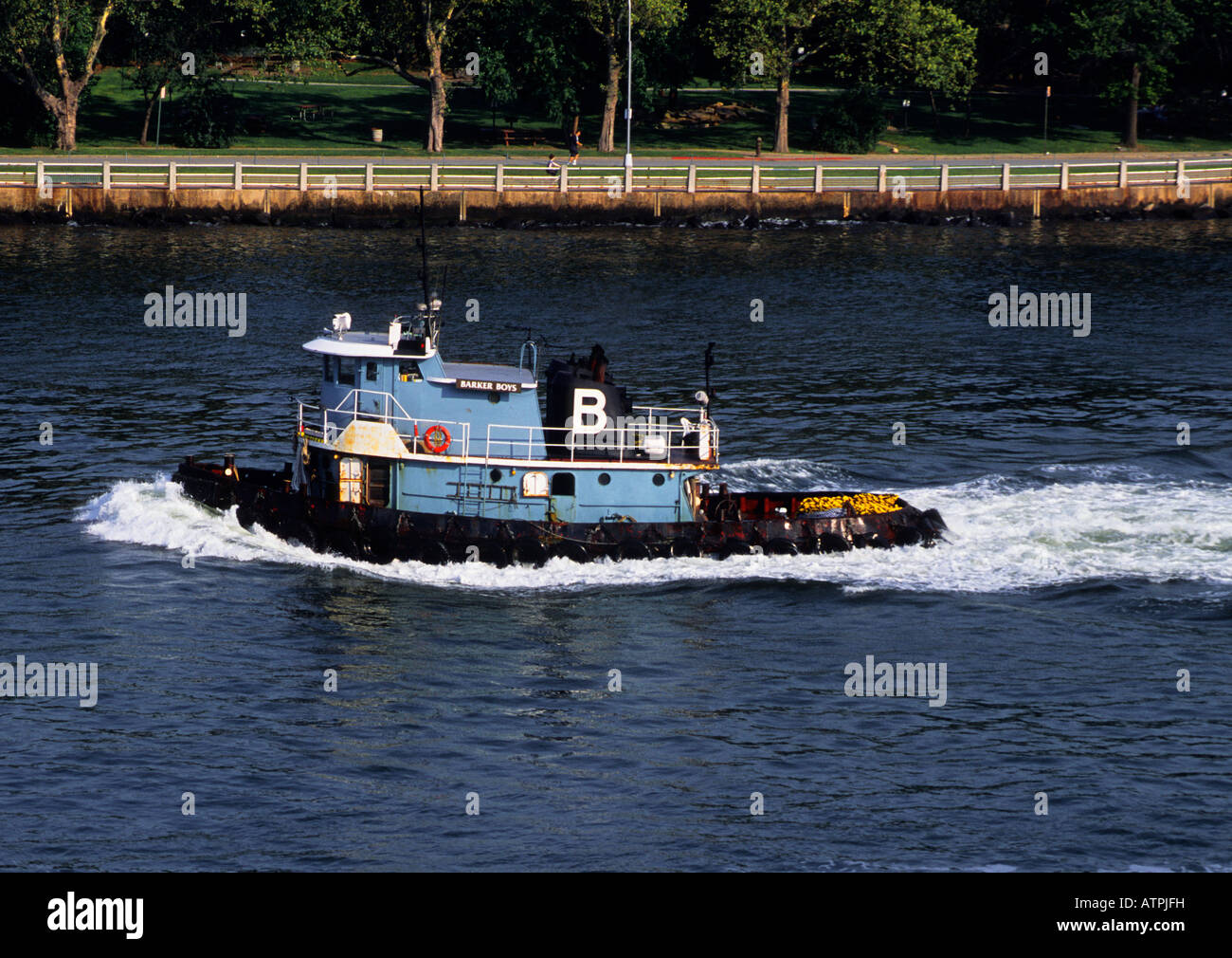 New York City, East River. Blue tugboat. USA Stock Photo - Alamy