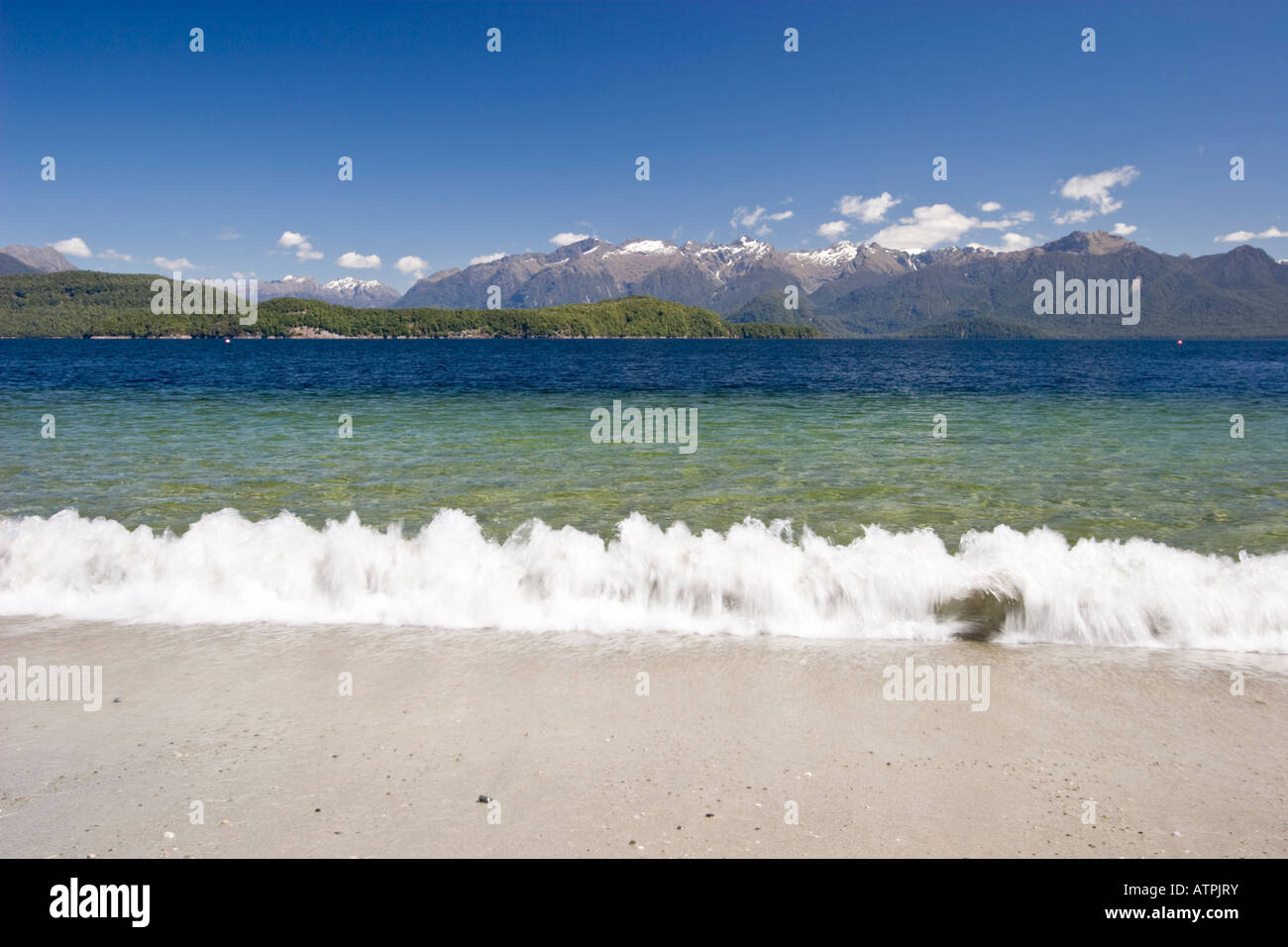 Beach at Lake Manapouri, New Zealand Stock Photo - Alamy
