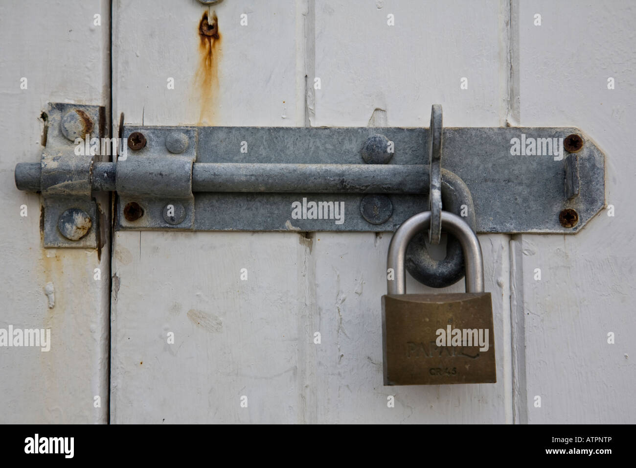 Lock on beach hut door hi-res stock photography and images - Alamy