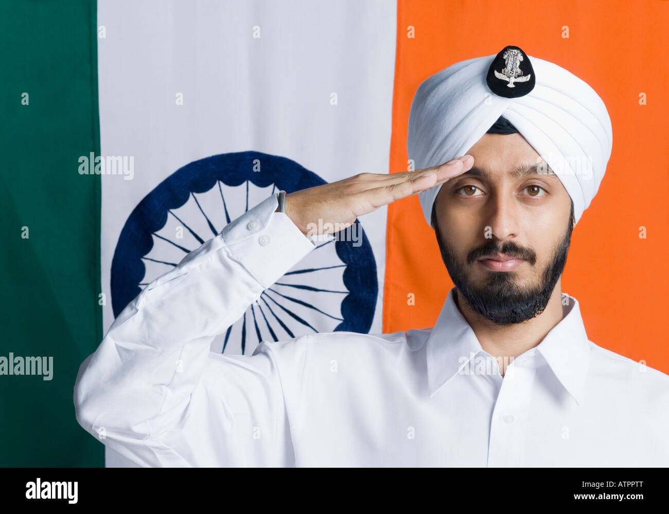 Portrait of a young man saluting Stock Photo - Alamy