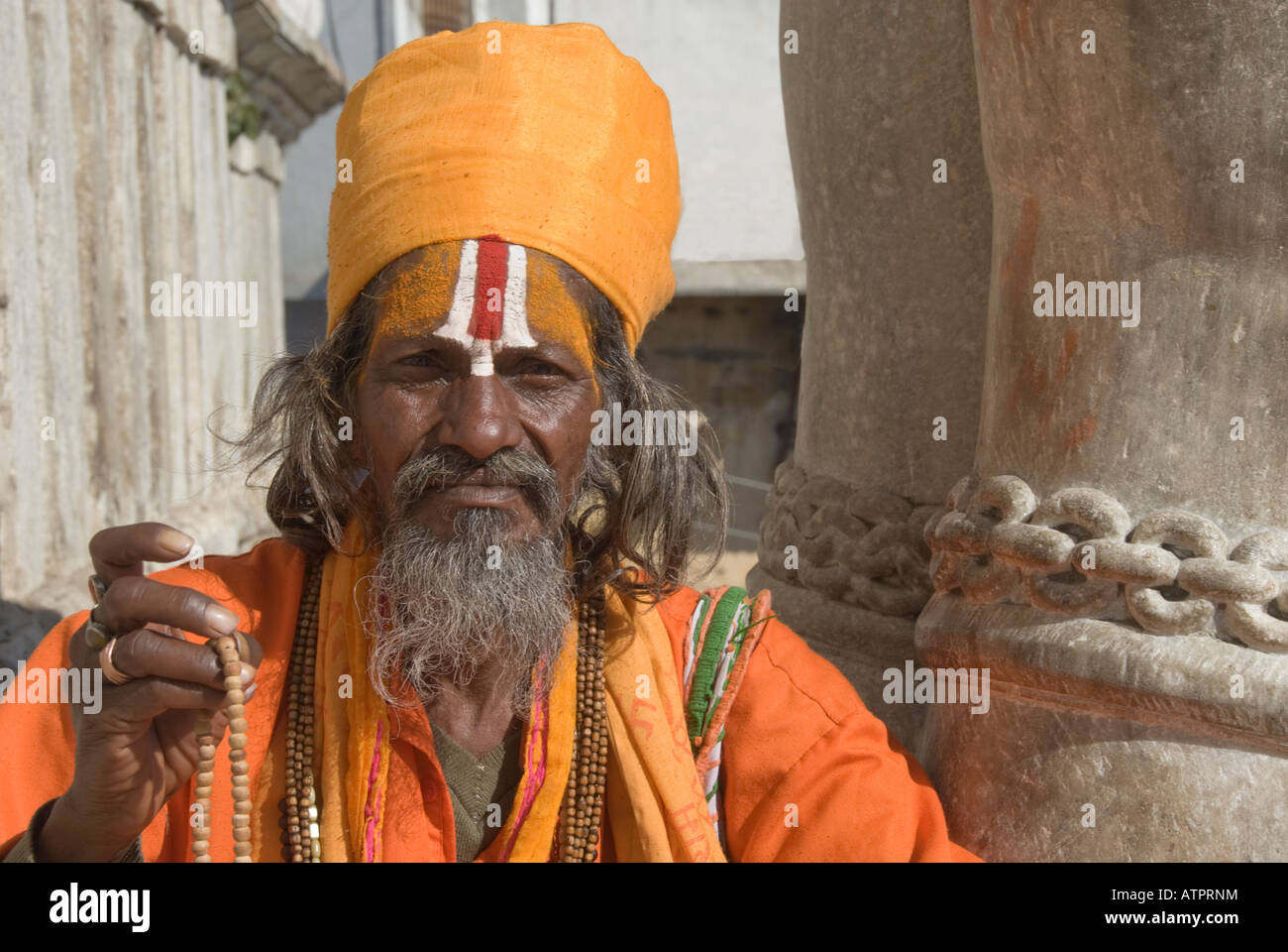 Indian Sadhu Sitting outside a temple in Udaiphur, Rajasthan Stock ...