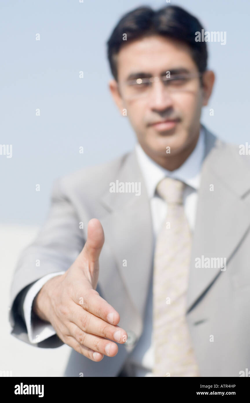 Close-up of a businessman extending his hand for handshake Stock Photo ...