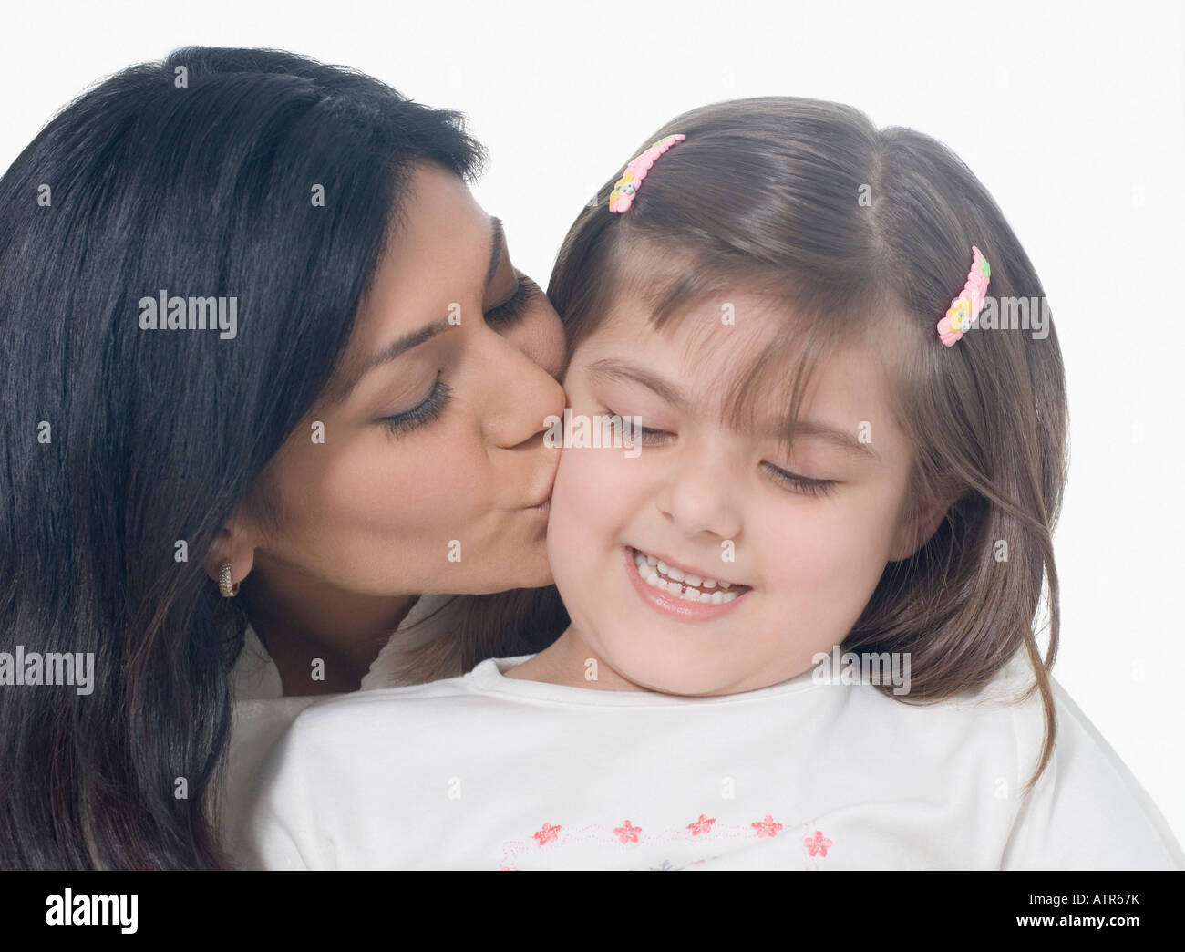 Daughter 4 5 kissing mother hi-res stock photography and images - Alamy