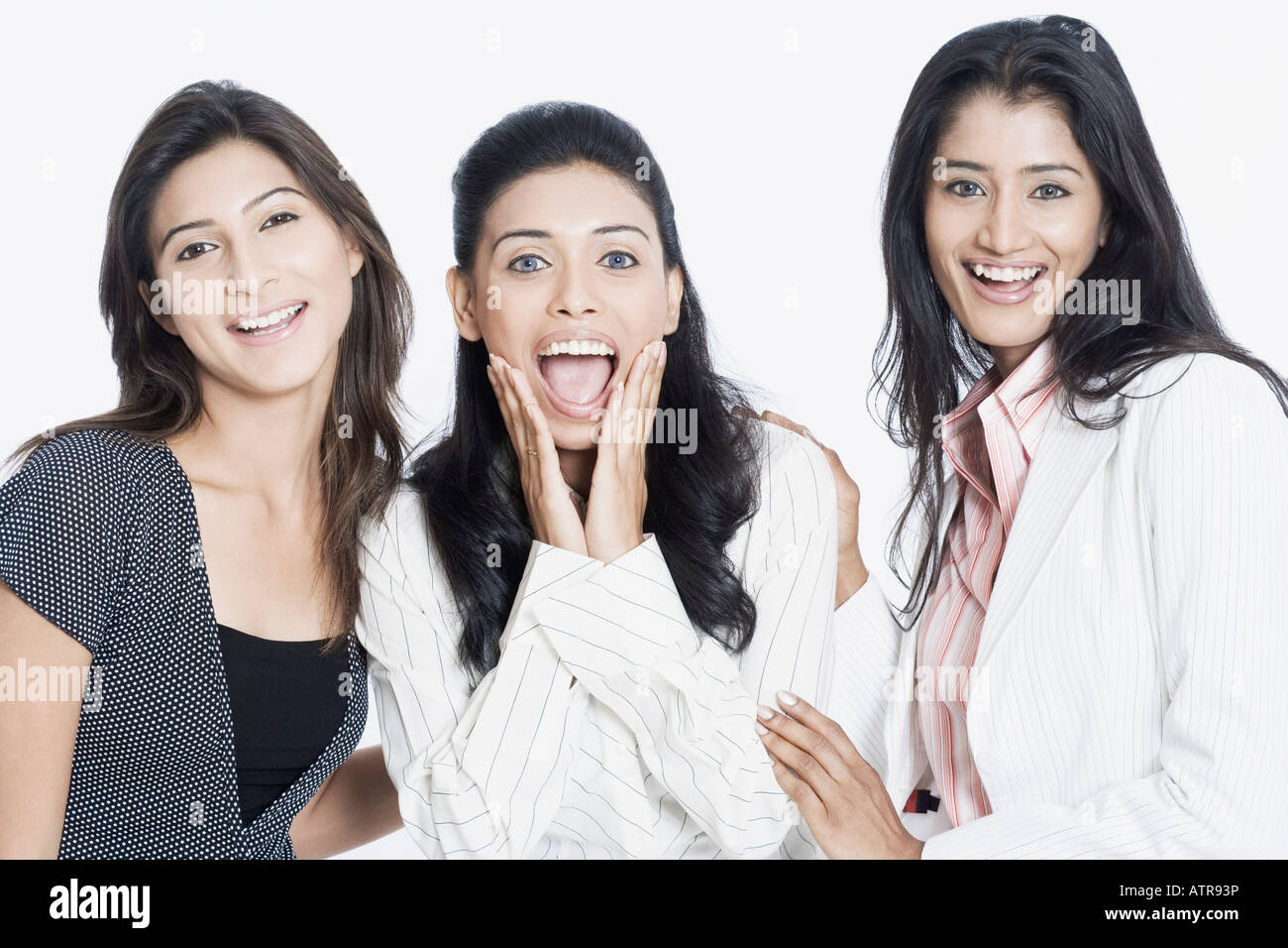 Portrait of three young women smiling Stock Photo - Alamy