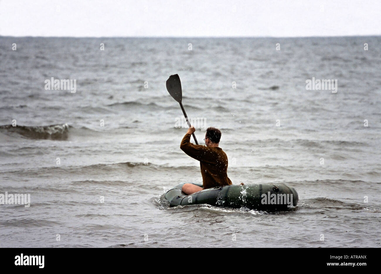Man oaring boat hi-res stock photography and images - Alamy