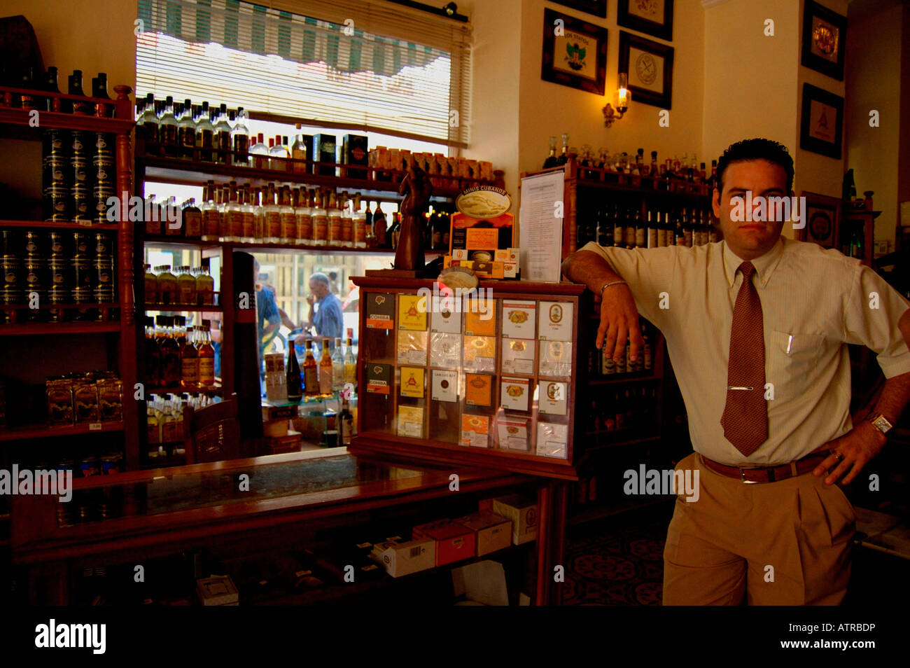 Salesman at shop / Cienfuegos Stock Photo - Alamy