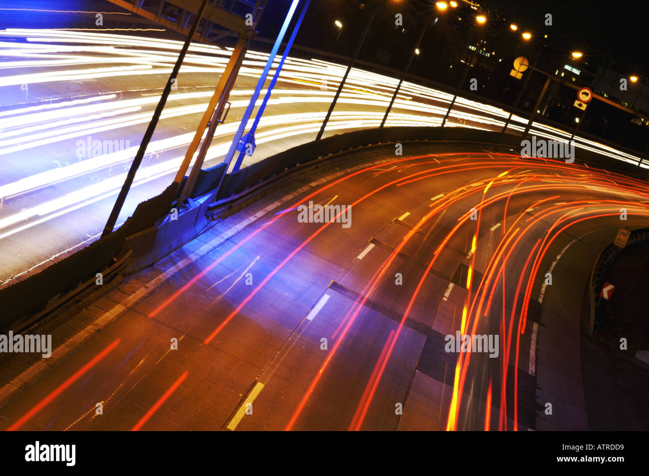 traffic at city highway at evening, light effects Stock Photo - Alamy