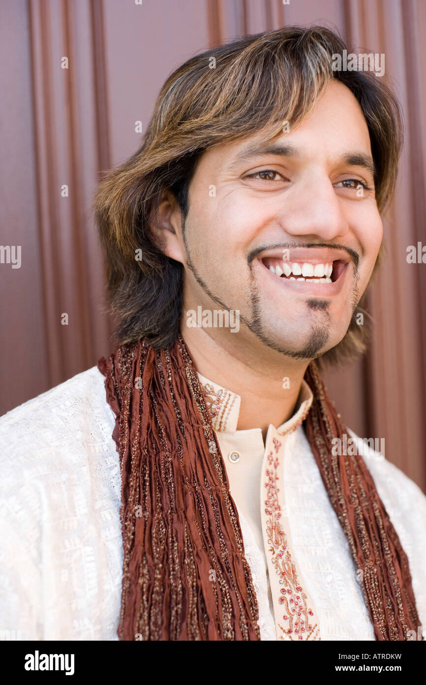 Close-up of a young man smiling Stock Photo - Alamy