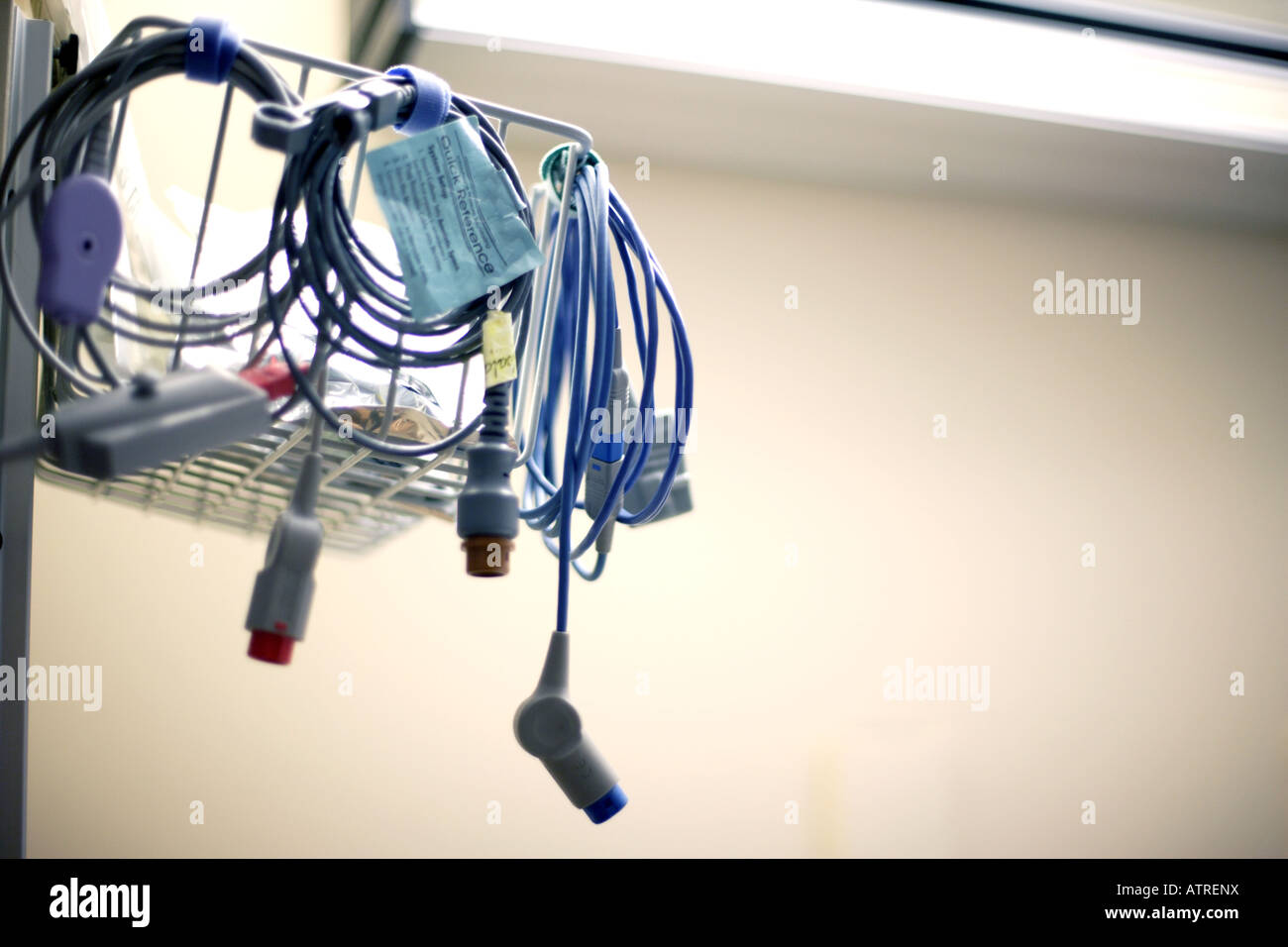 bunches of medical wires hang above a hospital bed Stock Photo - Alamy