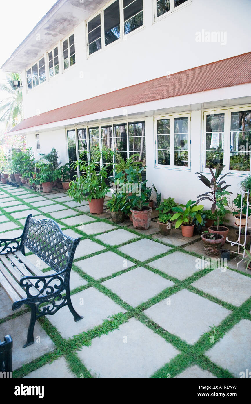 Bench in front of a house Stock Photo - Alamy