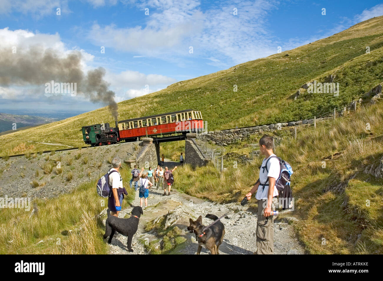 Steam locomotive Snowdon Mountain Railway and walkers Stock Photo - Alamy