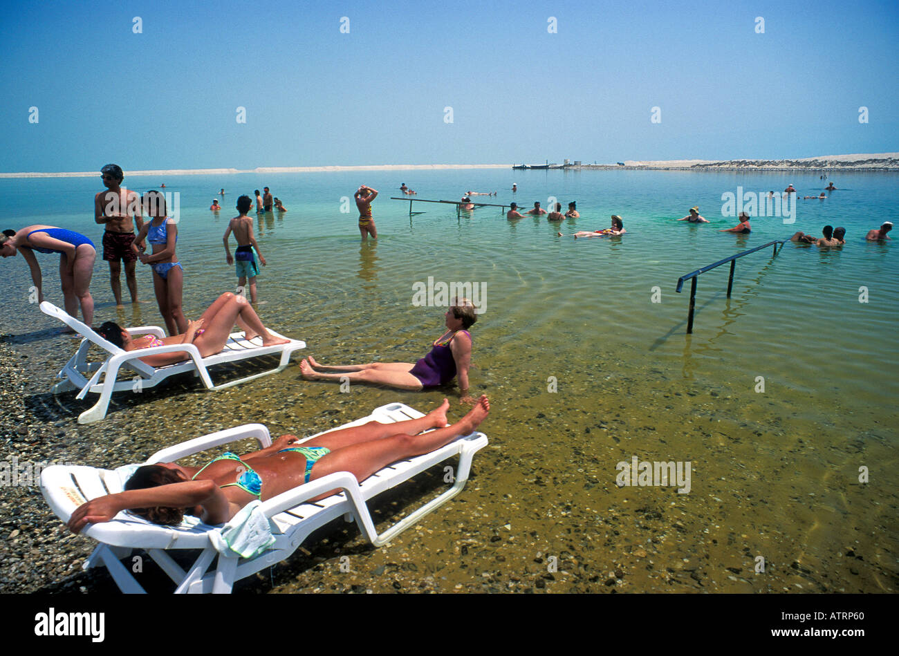 People swimming and bathing in Dead Sea Israel Stock Photo - Alamy