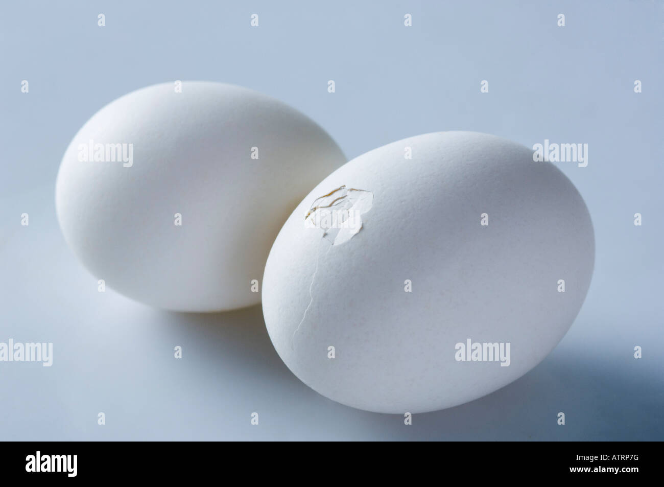 Two cracked up eggs hi-res stock photography and images - Alamy
