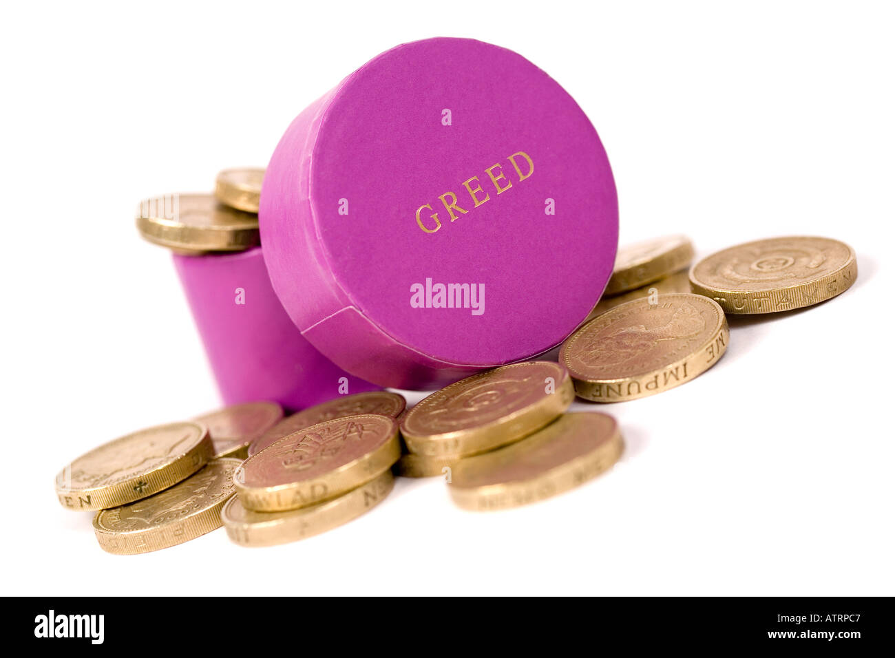 Gold Coins in Box Labelled Greed Stock Photo - Alamy