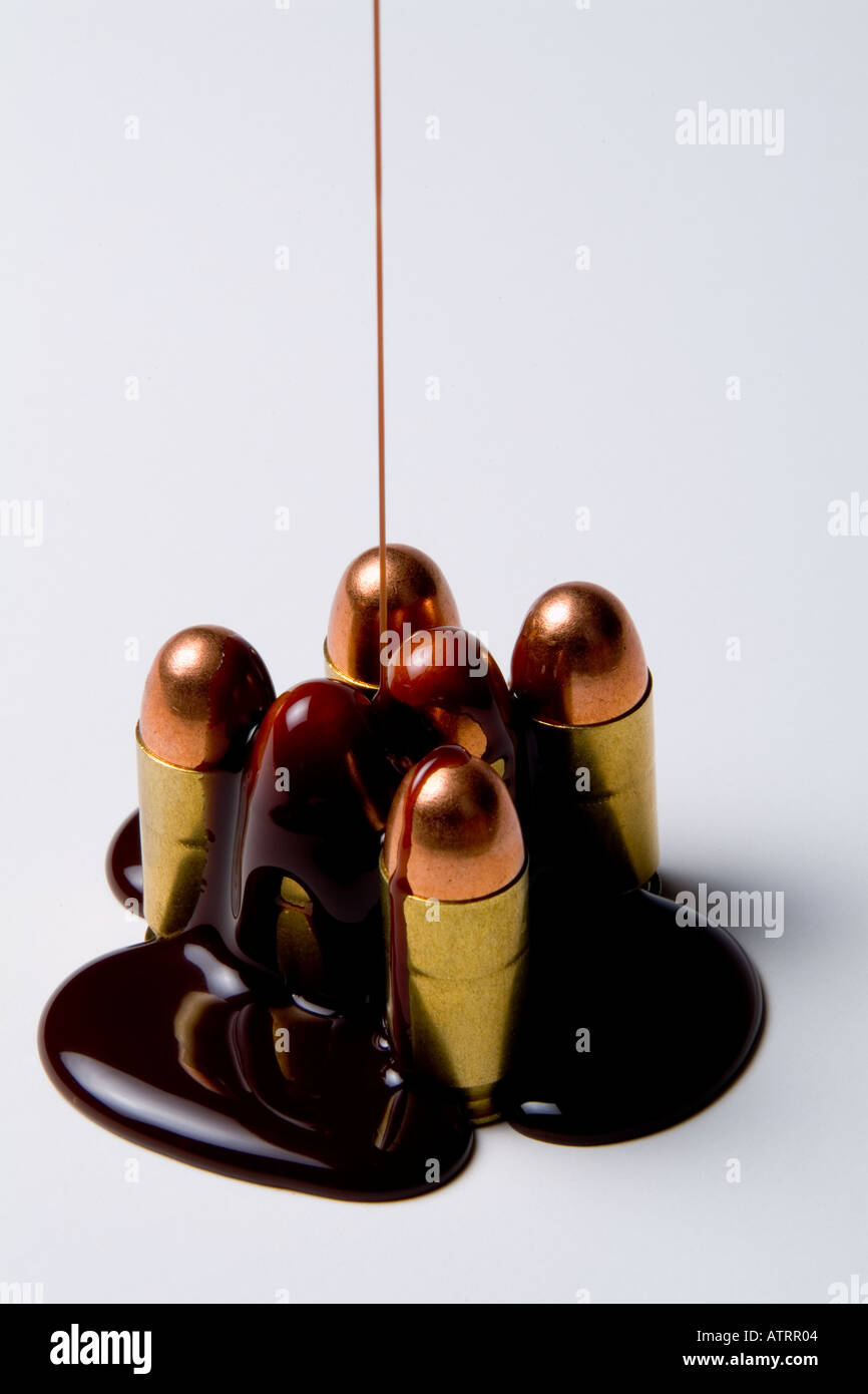 Blood pouring over bullets and pooling on white background Stock Photo ...