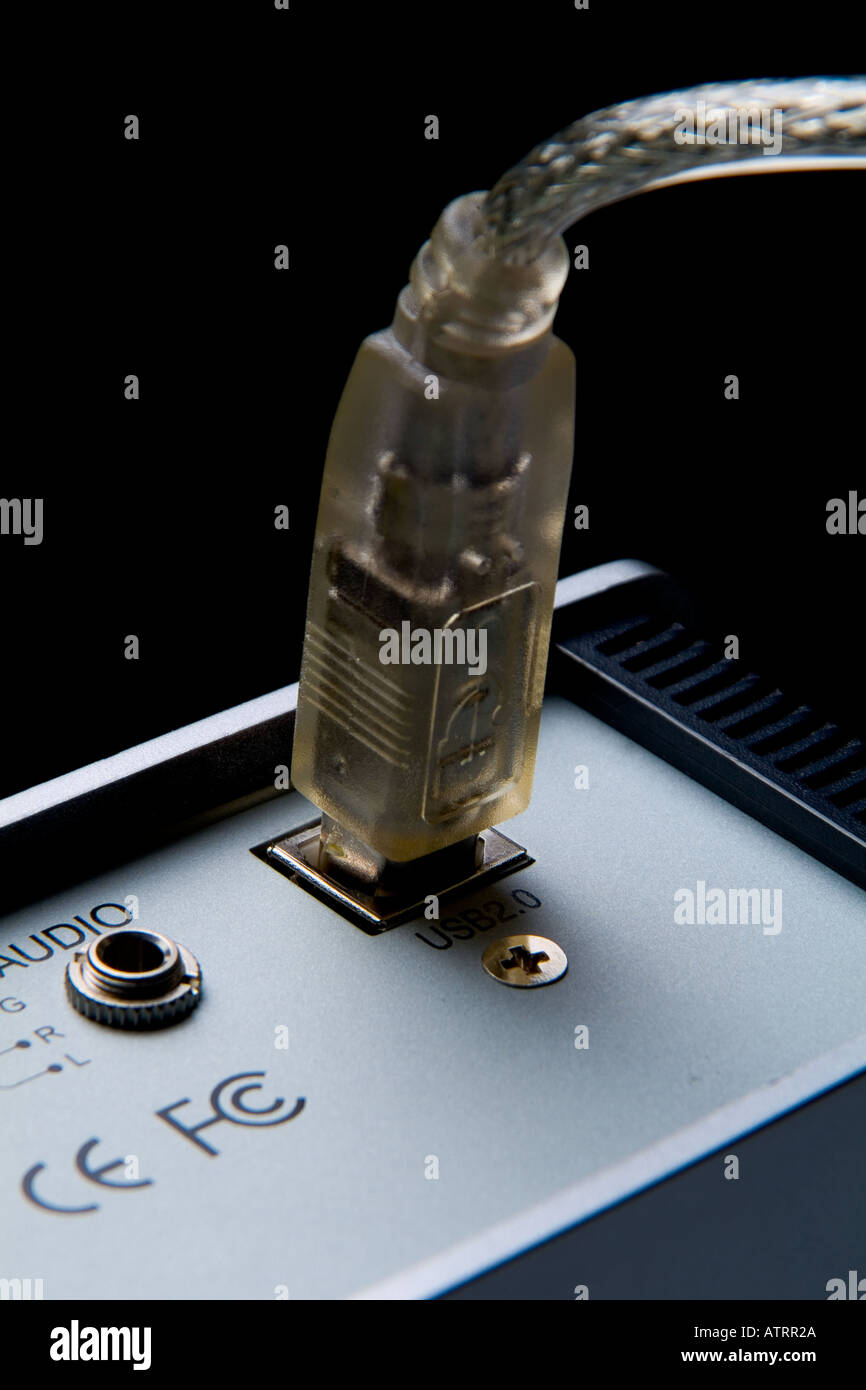 USB Cable connected to computer peripheral device Stock Photo - Alamy