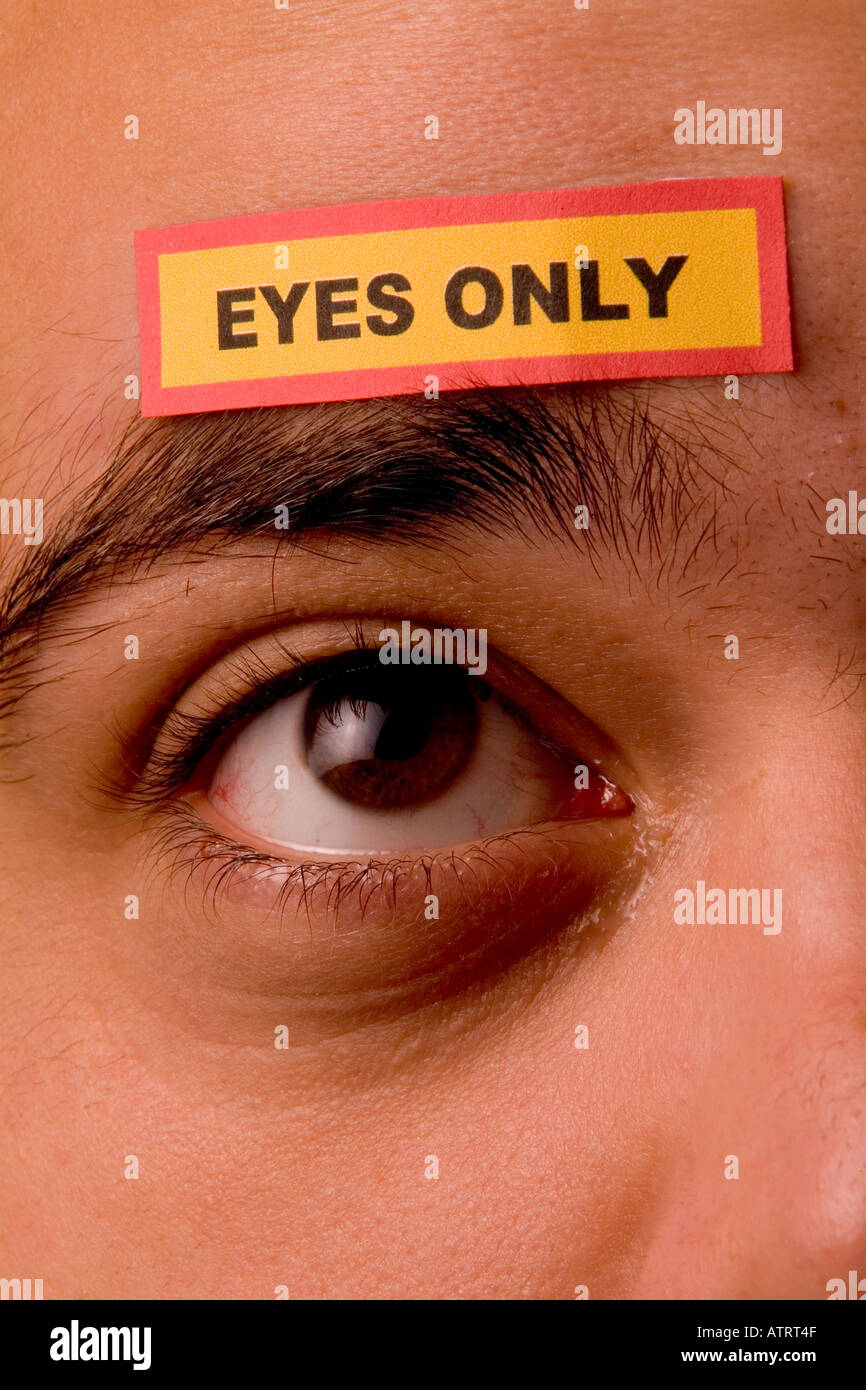 Close up of human eye staring at EYES ONLY label Stock Photo - Alamy