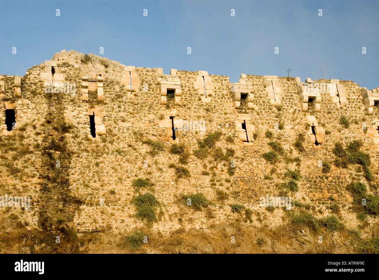 Massive towering walls and ramparts in the early morning sunlight, Crac ...