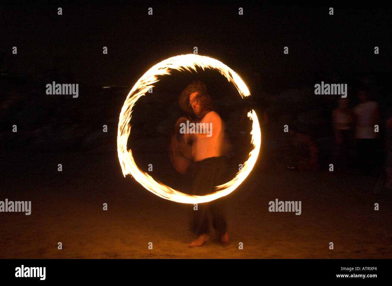 juggling fire night shot Stock Photo - Alamy
