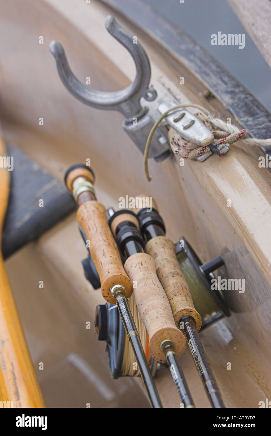 Fishing rods and reels on a rowing boat Stock Photo - Alamy