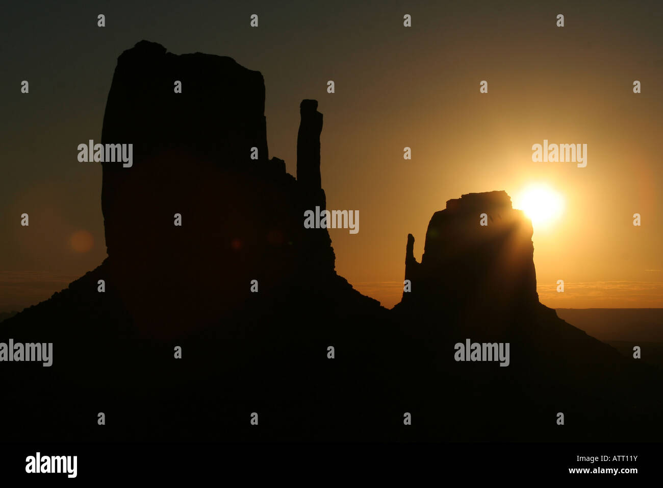 the mittens of monument valley at sunrise Stock Photo - Alamy