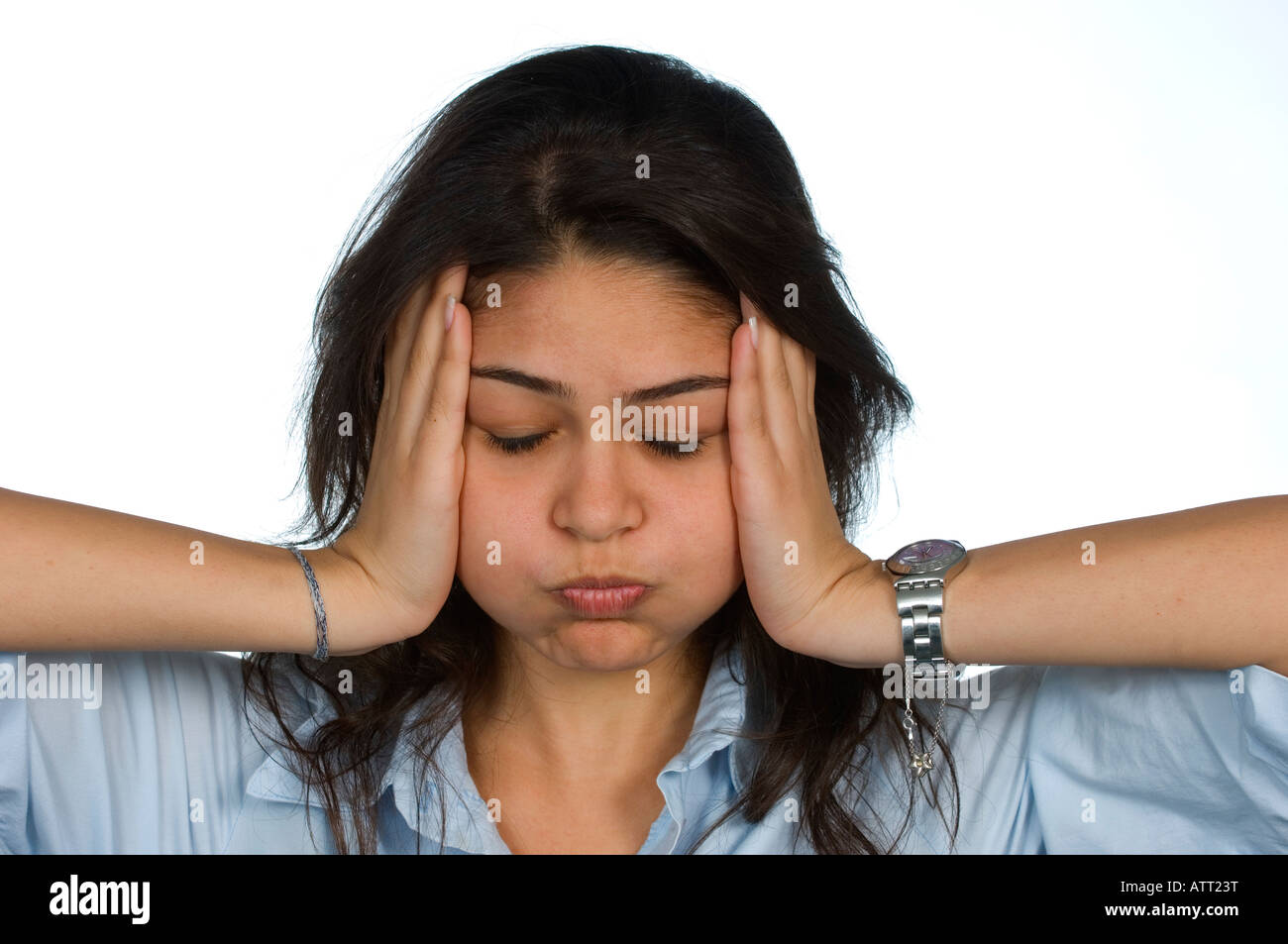 young woman clutching head with her hands Stock Photo - Alamy