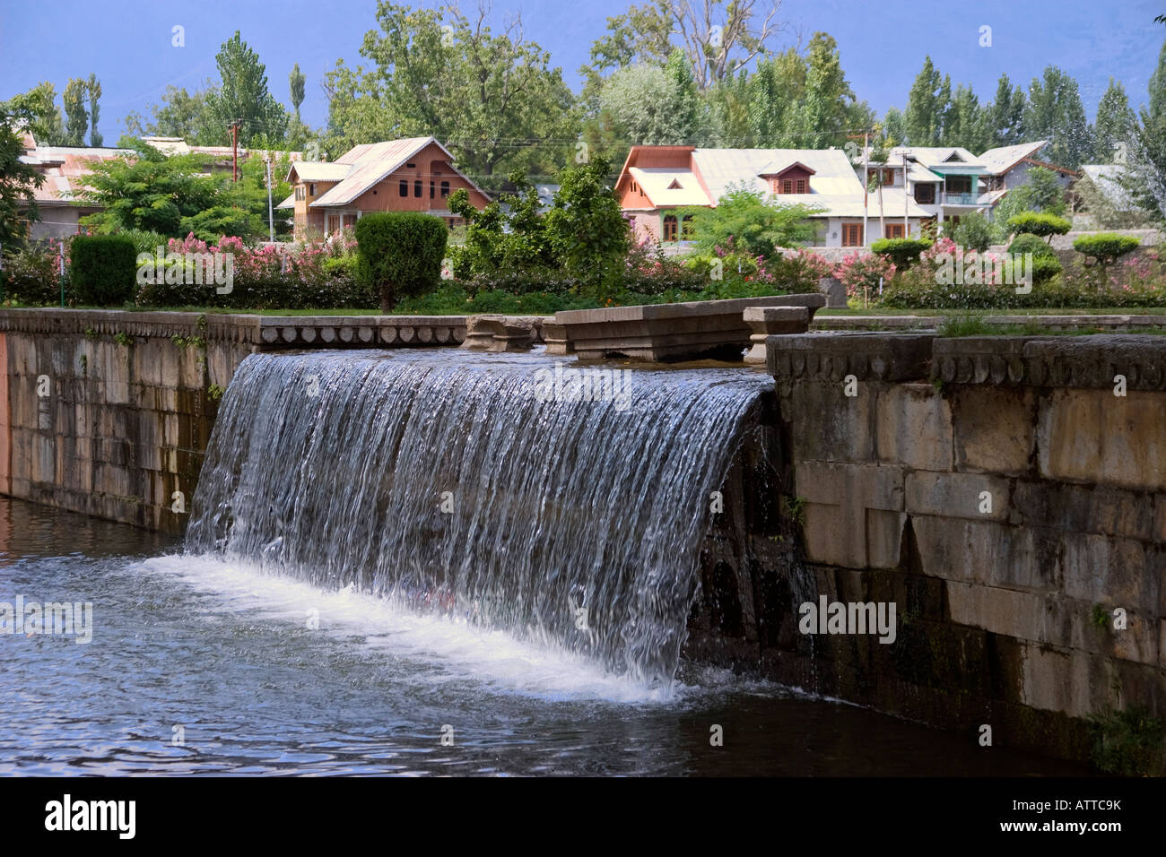 Looking across the waterfall in the Shalimar Bagh Gardens Srinagar ...