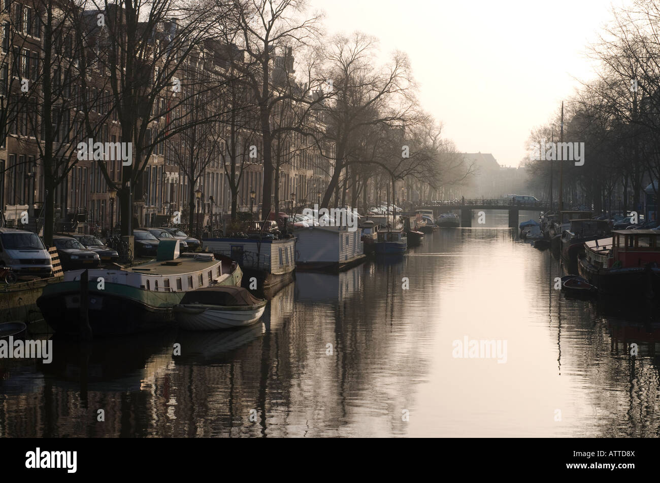 Sunset on a canal in Amsterdam Netherlands Stock Photo - Alamy