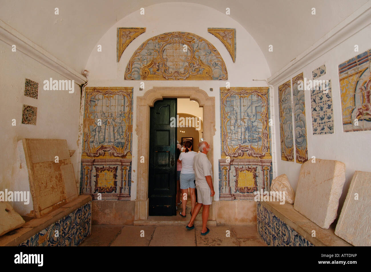 Tourists entering Museu Municipal Dr. Jose Formosinho museum in the old ...
